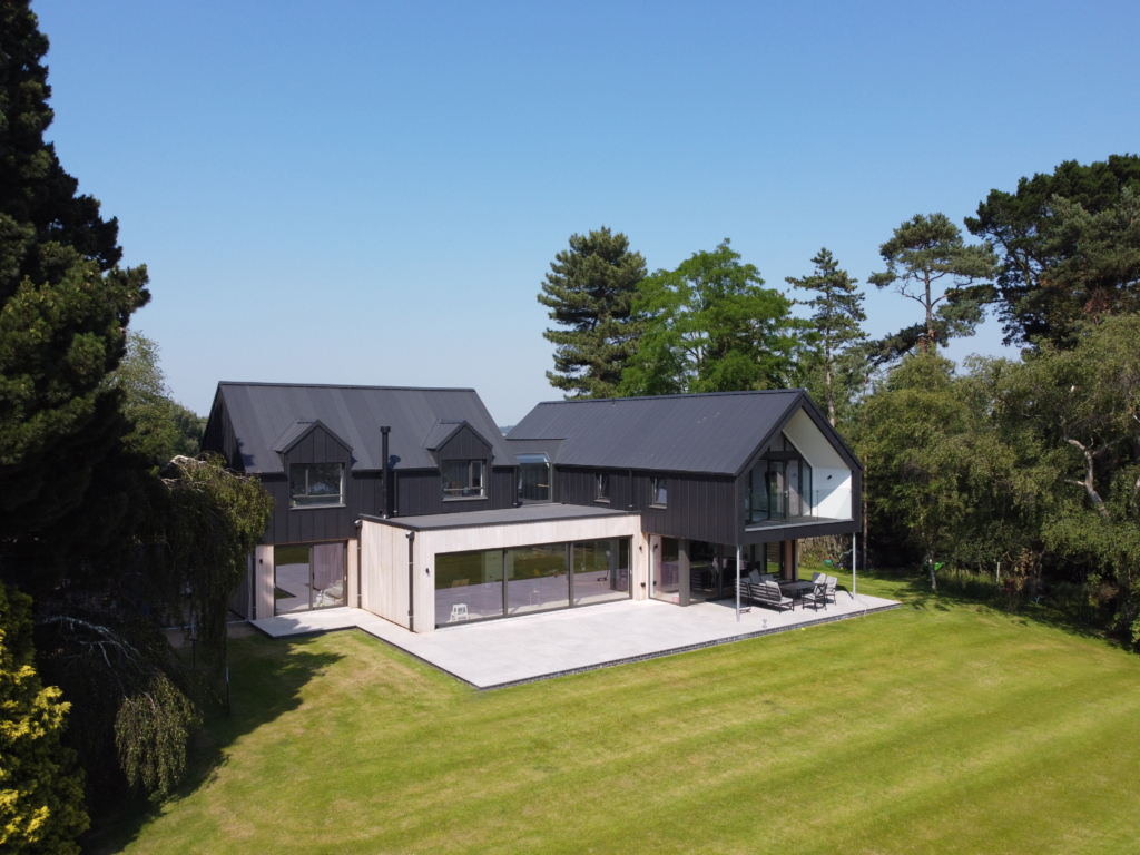 Extension: development of dated house in Area of Outstanding Natural ...